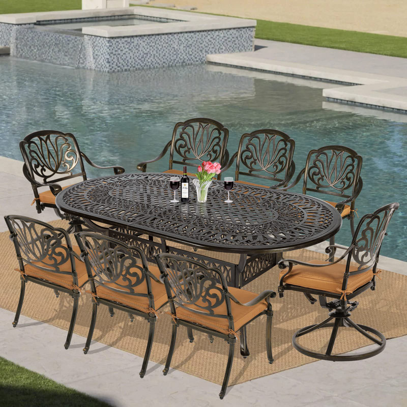 Bloomsbury Market Risingsun Oval 8 Person 83.8 Long Dining Set with Cushions Wayfair
